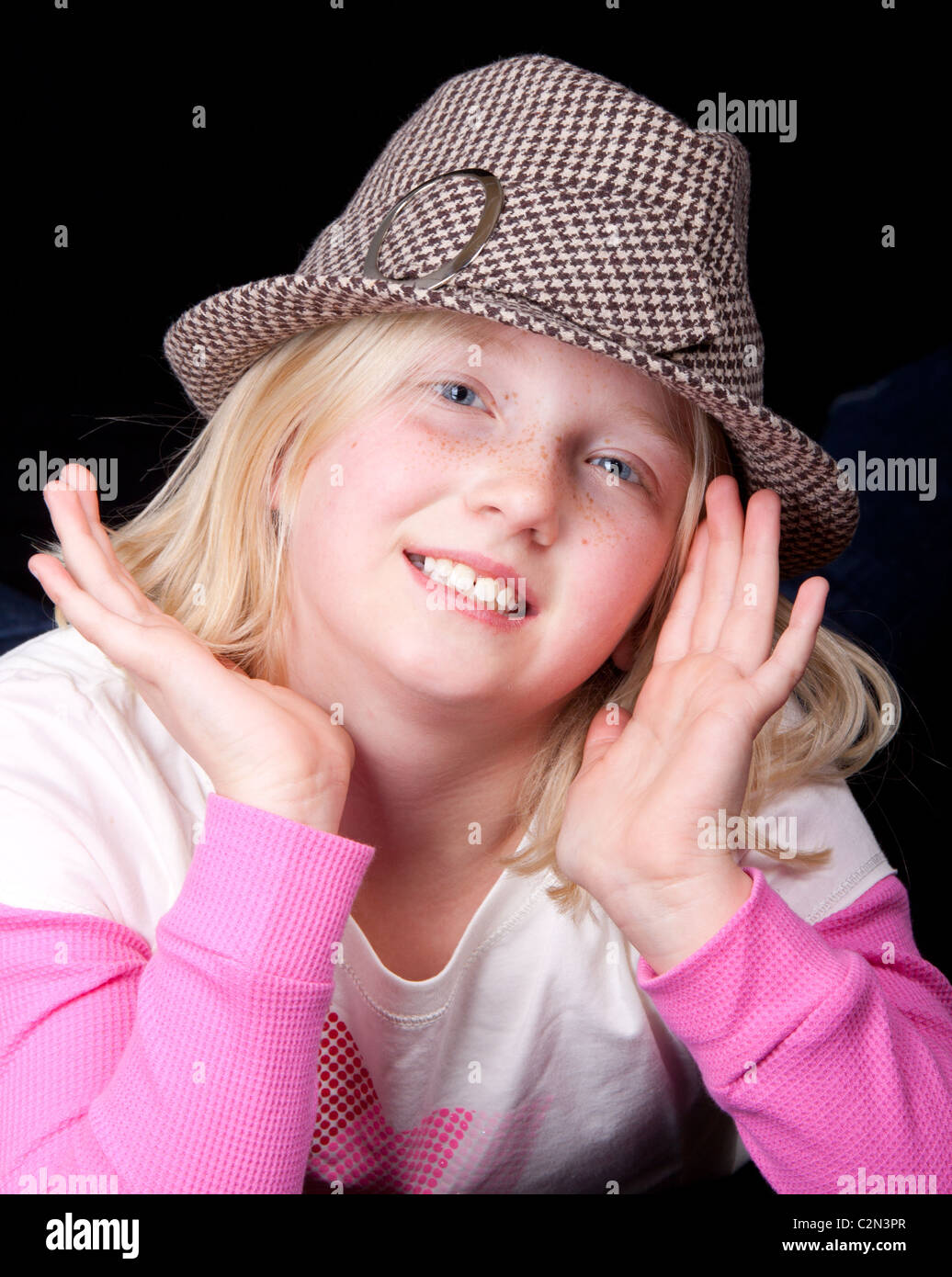 A girl has a look of being slightly surprised Stock Photo - Alamy