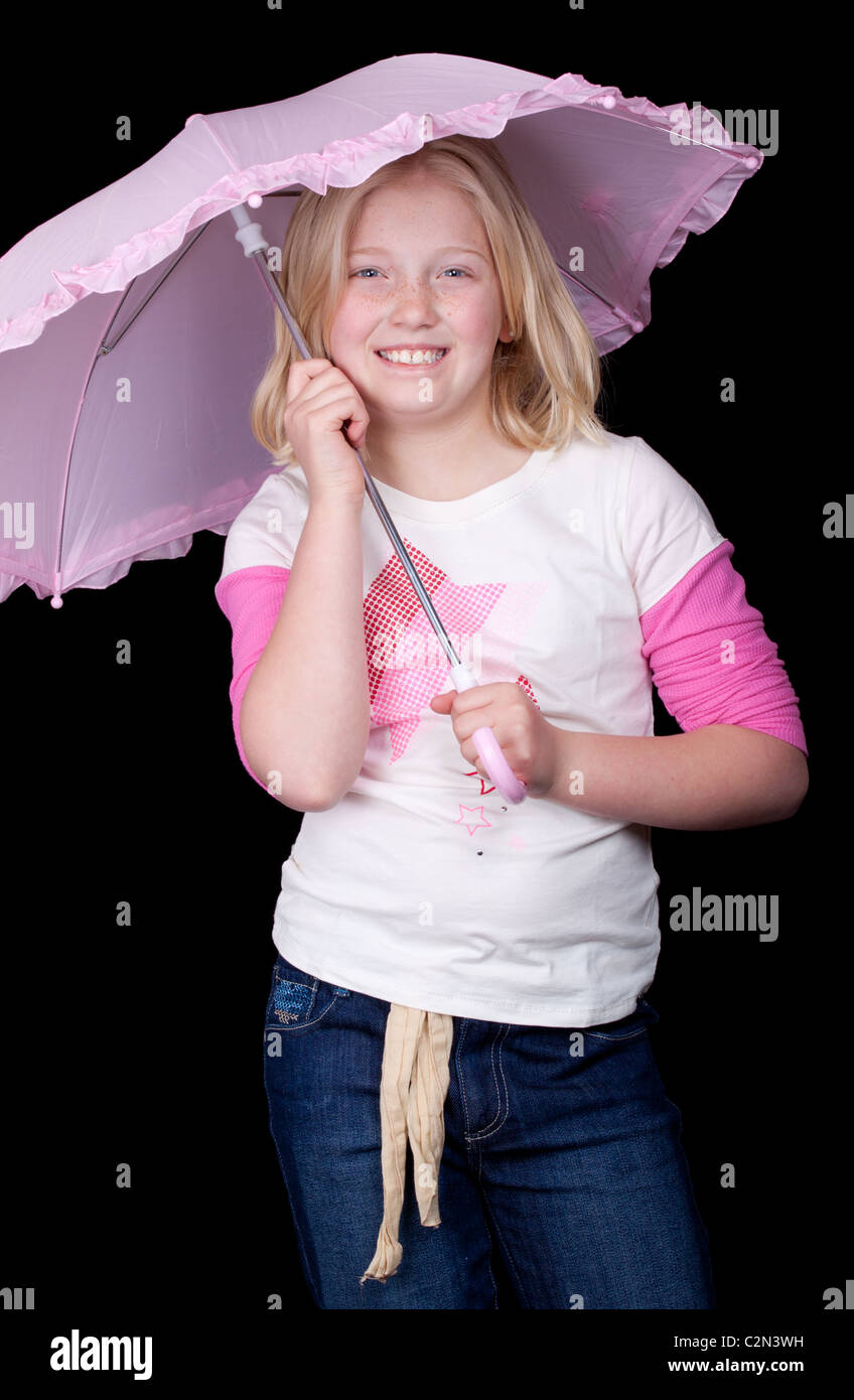 An adorable stock model poses with an umbrella Stock Photo - Alamy