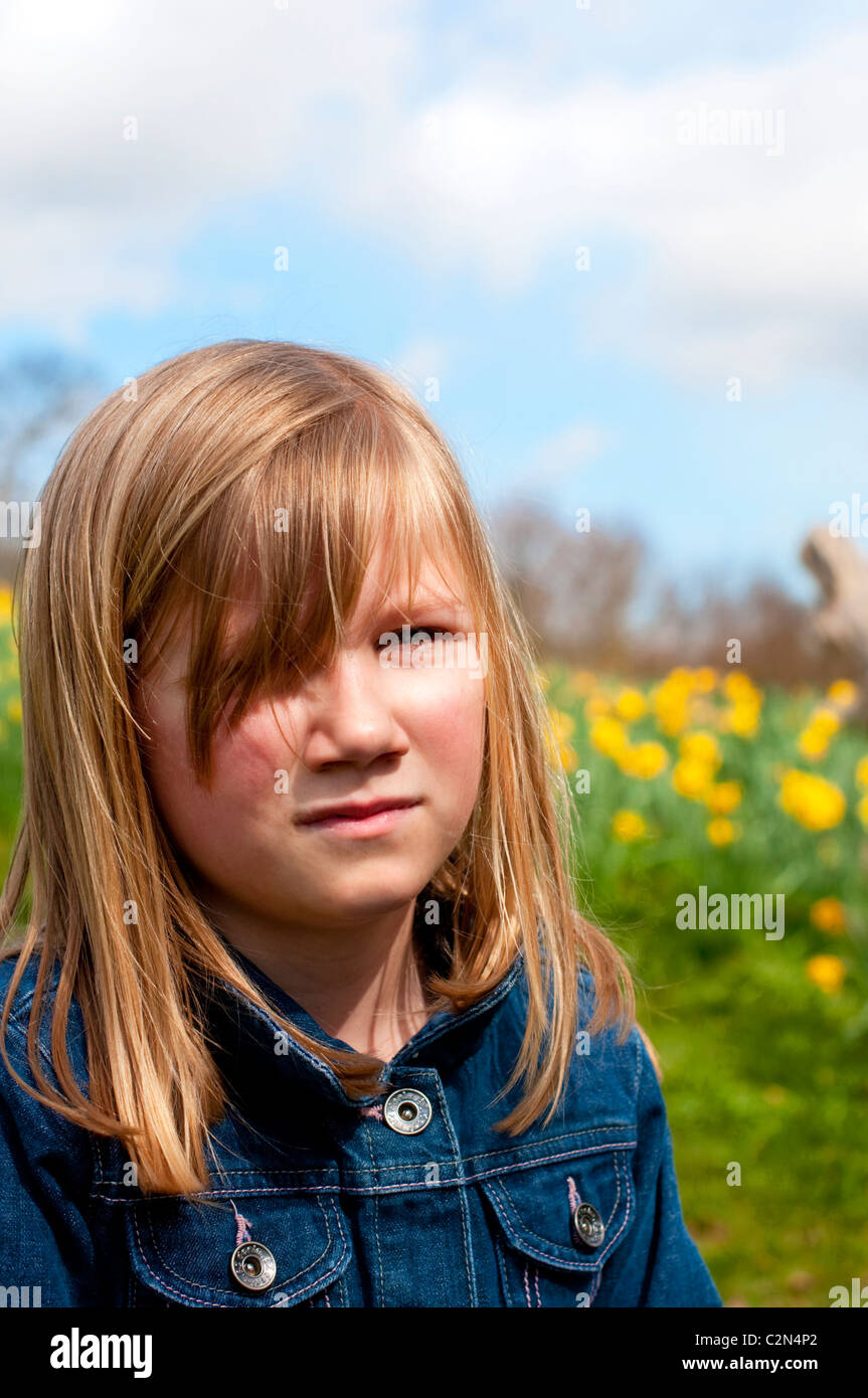 Pretty girl looking flowers hi-res stock photography and images - Alamy