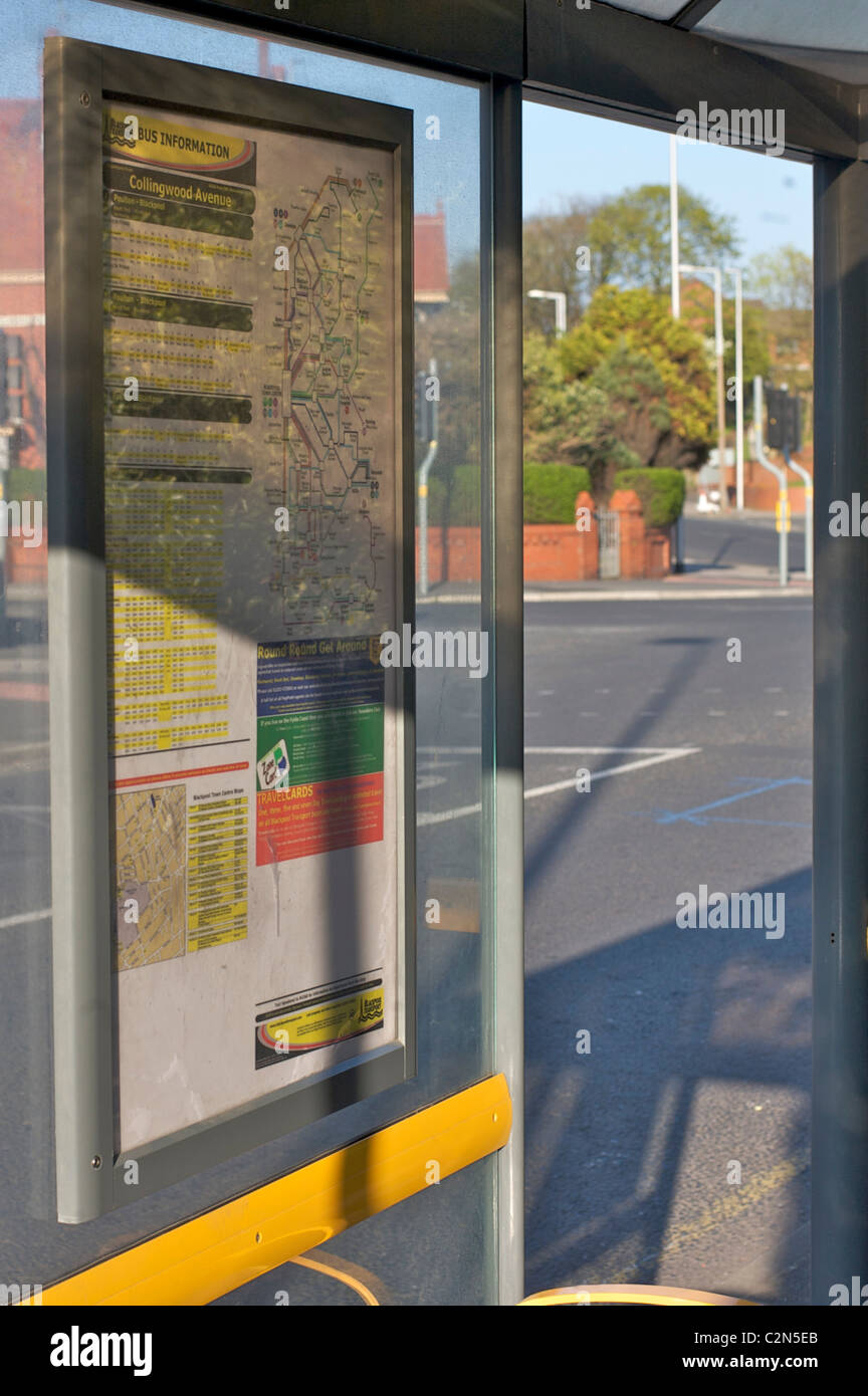 Bus shelter interior with route map on window Stock Photo - Alamy