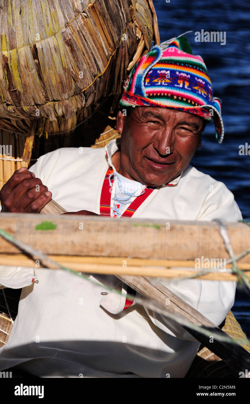 Indigeunos man in the traditional boat Stock Photo - Alamy