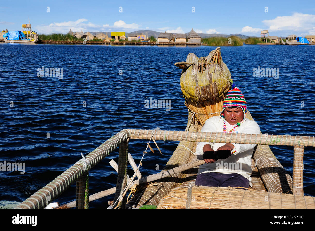 Indigeunos man in the traditional boat Stock Photo - Alamy