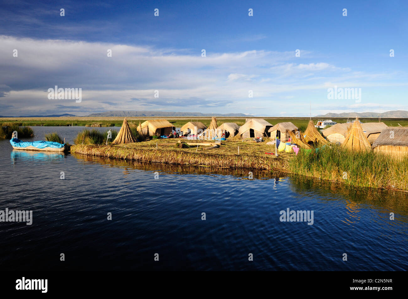 Traditional houes at the floating island in Peru Stock Photo - Alamy