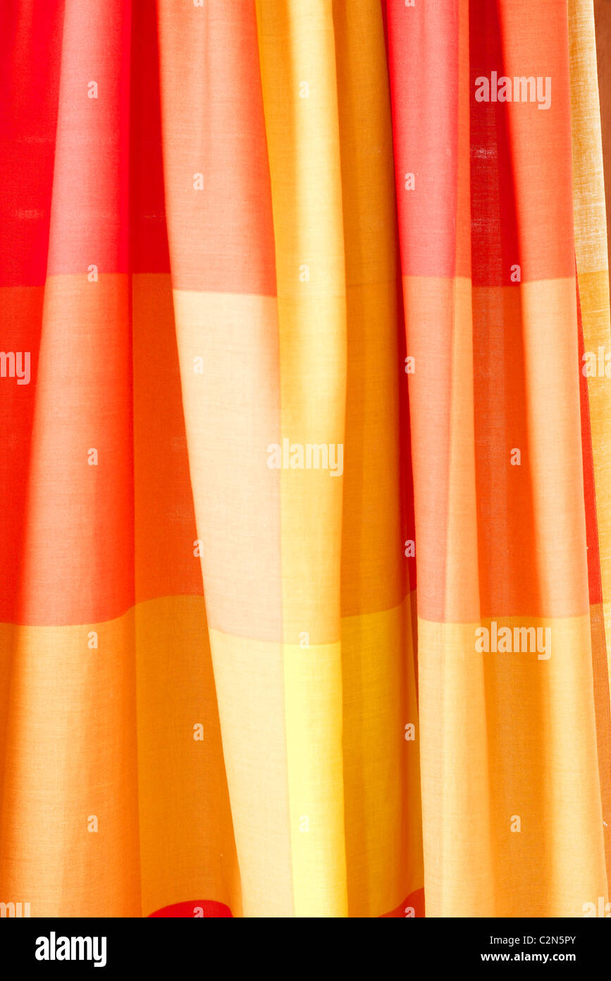 Decorated orange drapery background Stock Photo - Alamy