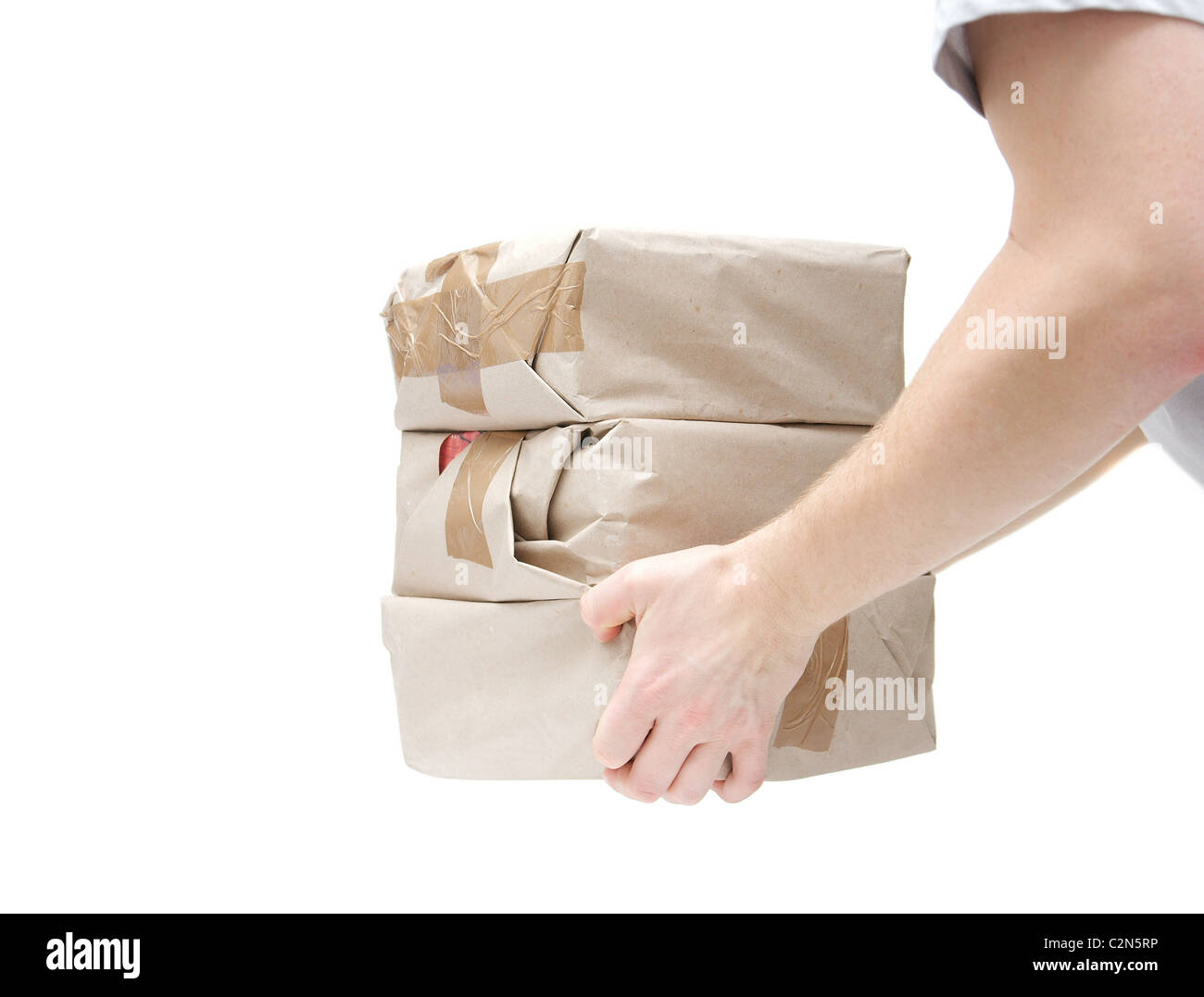 Holding packs isolated on a white background Stock Photo - Alamy