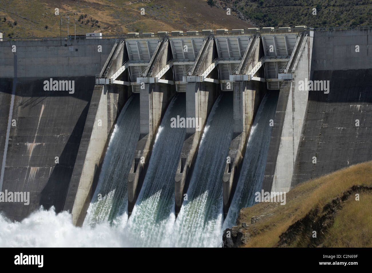 Water spilling from Clyde Dam, Clyde, Central Otago, South Island, New ...