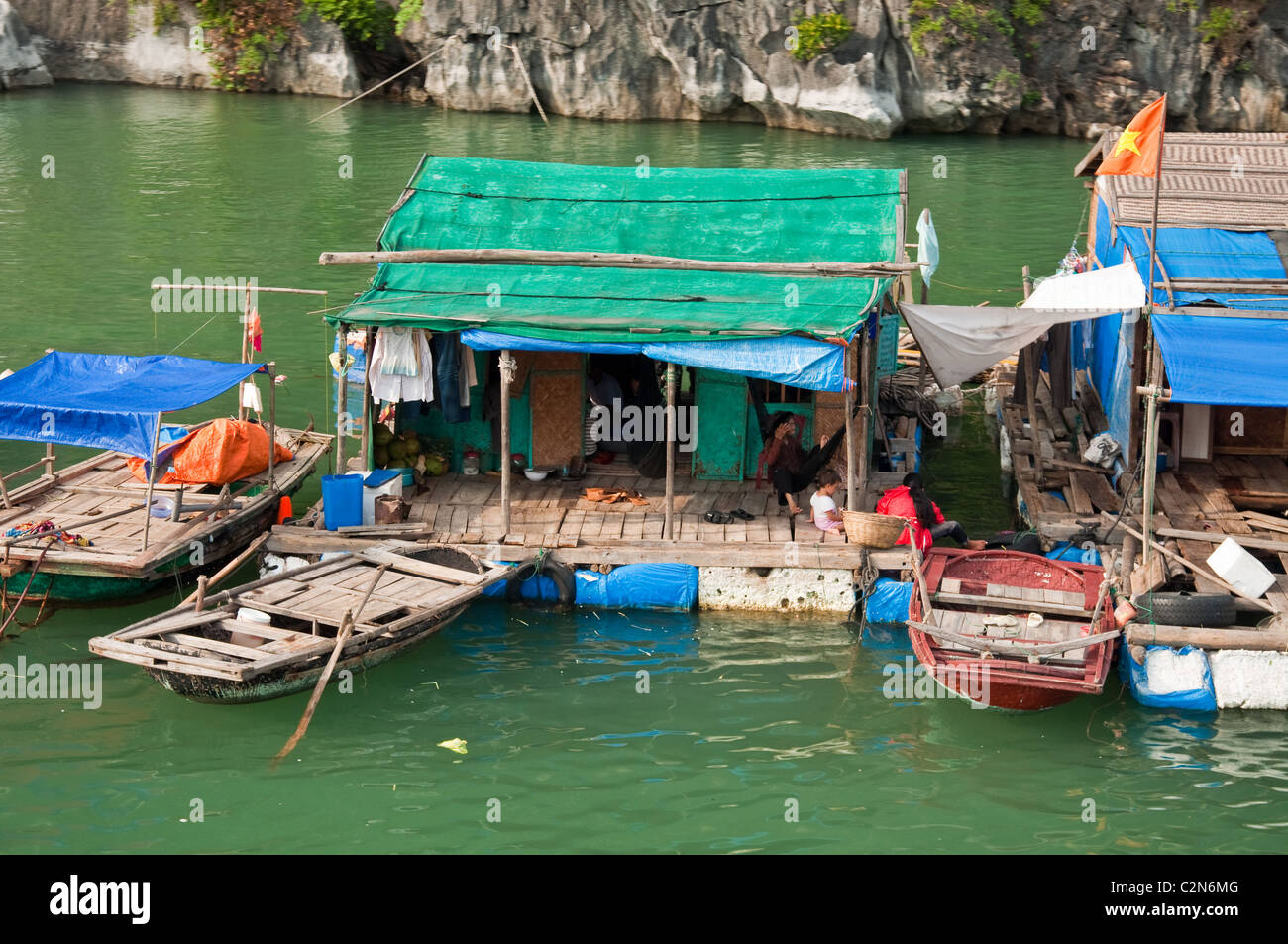 Floating village in Halong Bay, Vietnam Stock Photo - Alamy