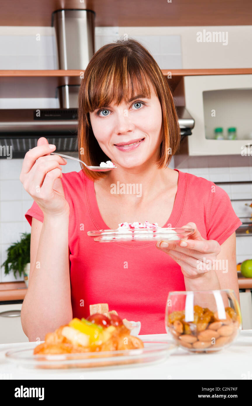 Beautiful woman having a healthy breakfast Stock Photo - Alamy