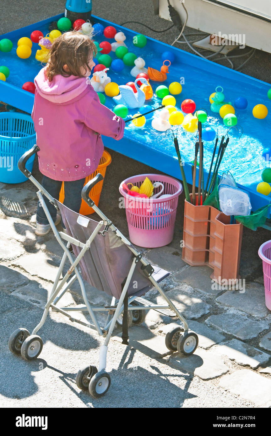 Young child at fairground - France Stock Photo - Alamy