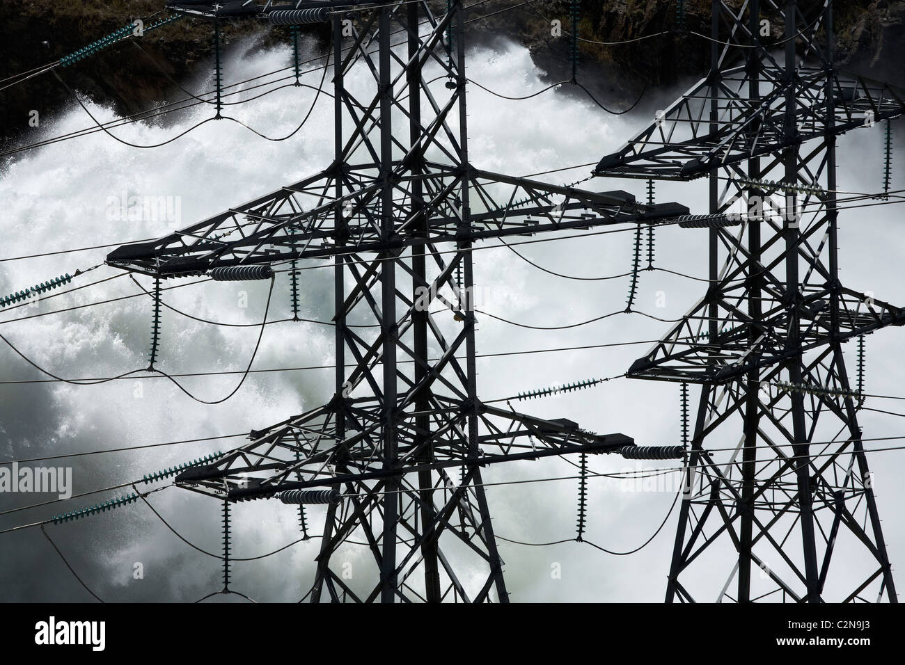 Water spilling from Clyde Dam, and pylons, Clyde, Central Otago, South ...