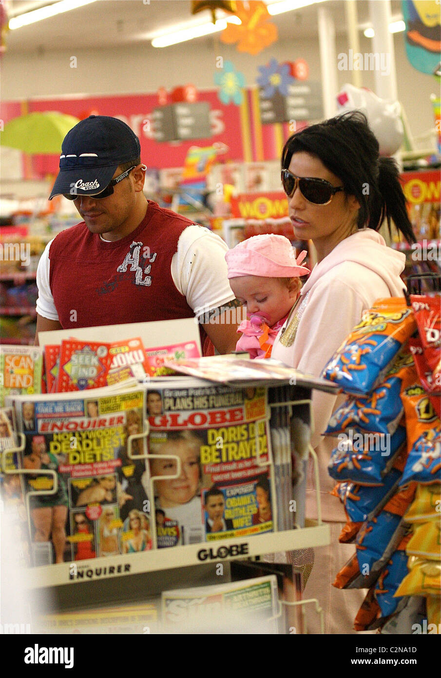 Katie Price and Peter Andre with their daughter Princess Tiáamii went ...