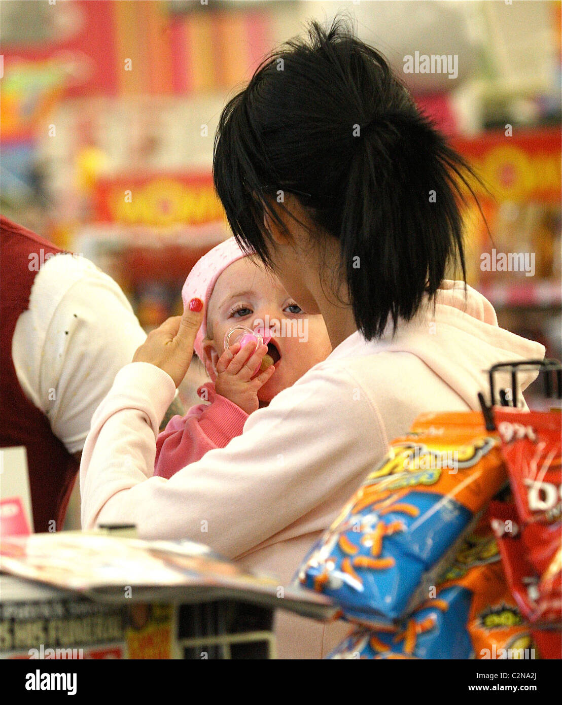 Katie Price and Peter Andre with their daughter Princess Tiáamii went ...