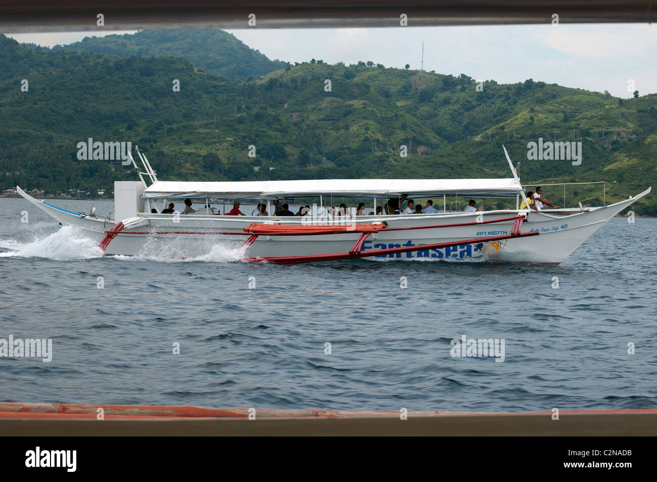 Philippine banca boat ferries tourists to Puerto Galera, Mindoro, one ...