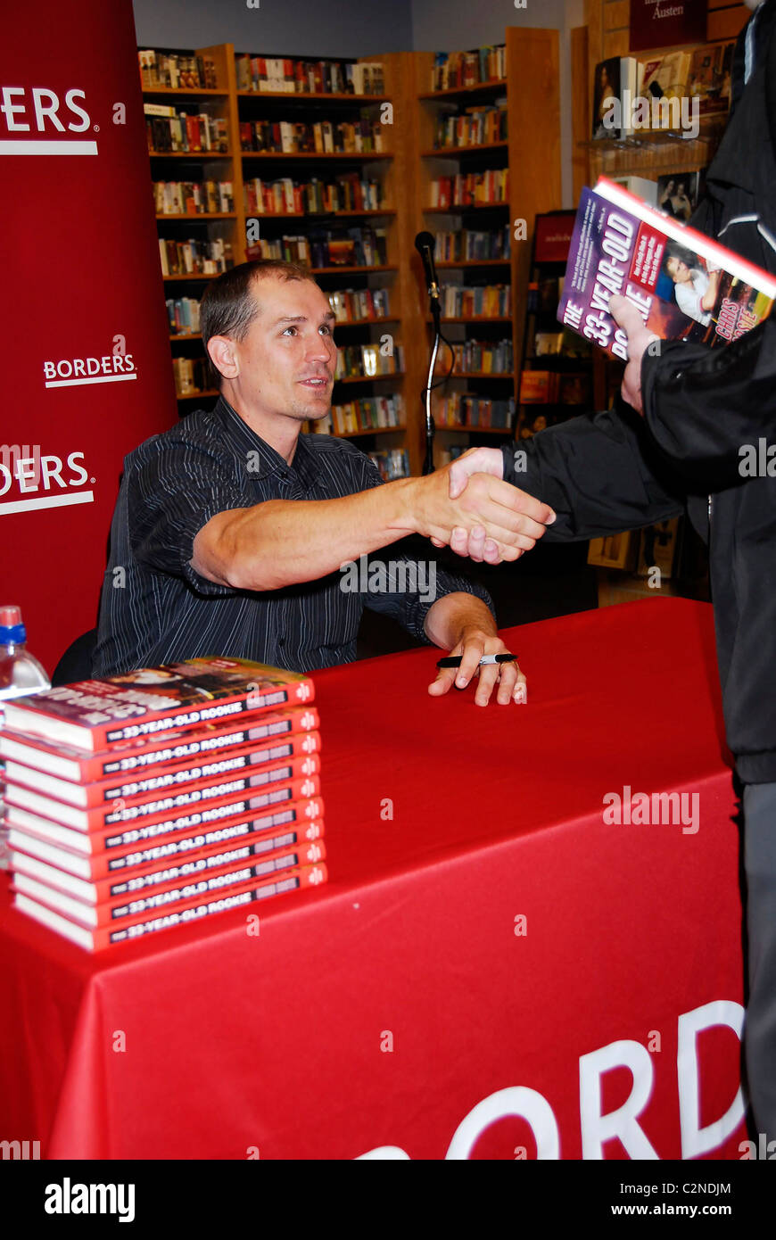 The Philadelphia Phillies catcher Chris Coste signs his new book '33 ...