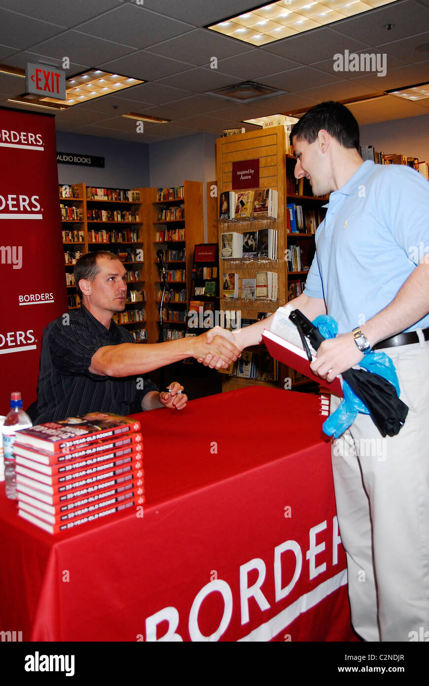 The Philadelphia Phillies catcher Chris Coste signs his new book '33 ...