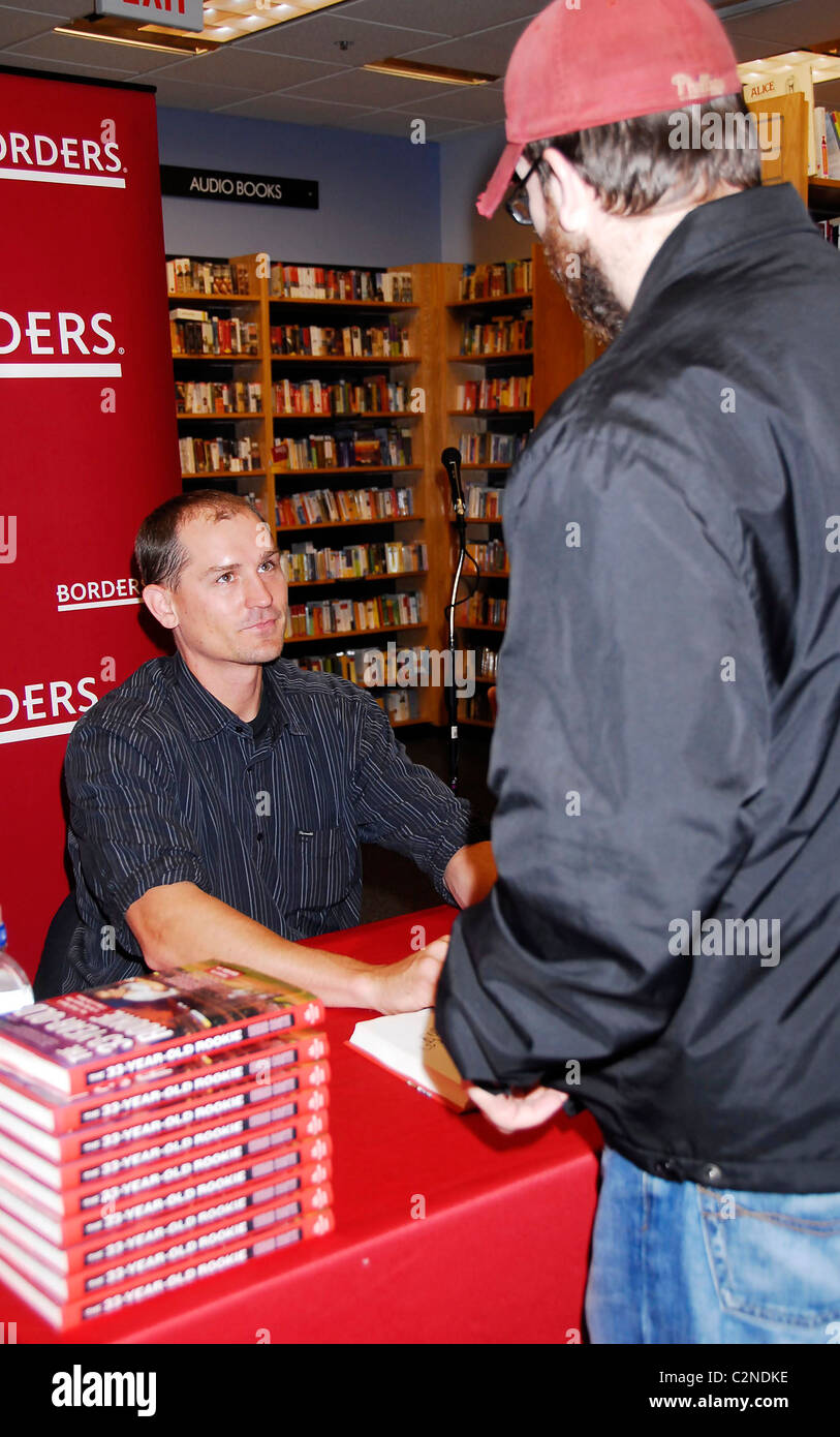 The Philadelphia Phillies catcher Chris Coste signs his new book '33 ...