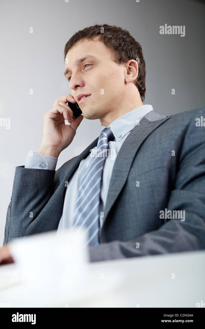 Portrait of handsome man calling by mobile phone Stock Photo - Alamy