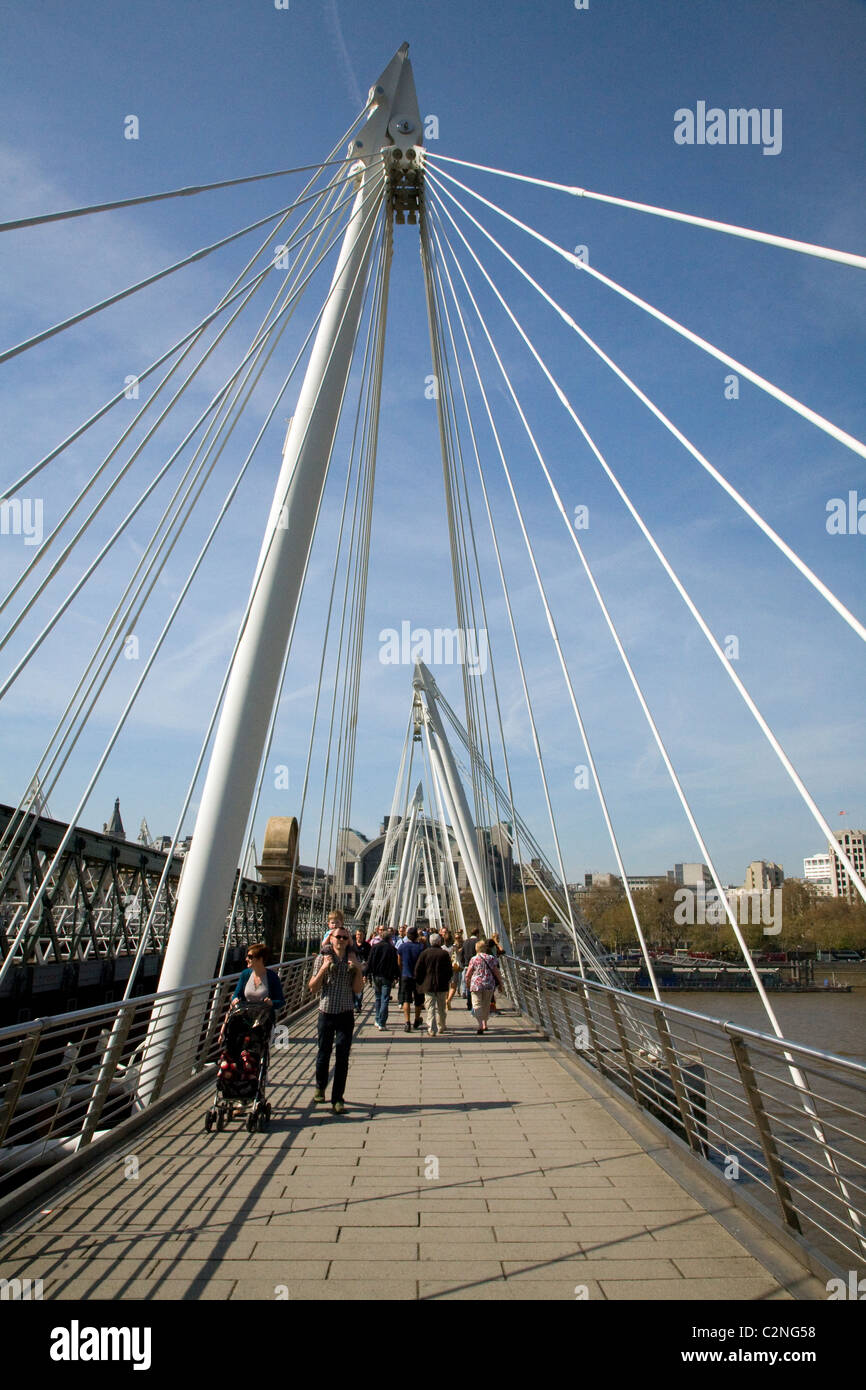 People walking over bridge hi-res stock photography and images - Alamy