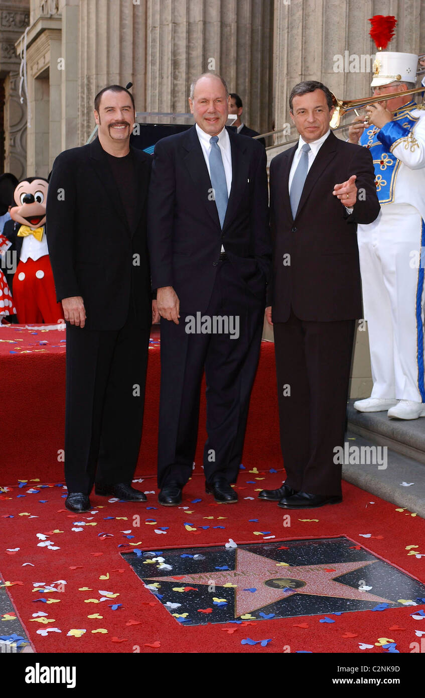 Bob Iger, John Travolta, Michael D. Eisner Michael D. Eisner honoured ...