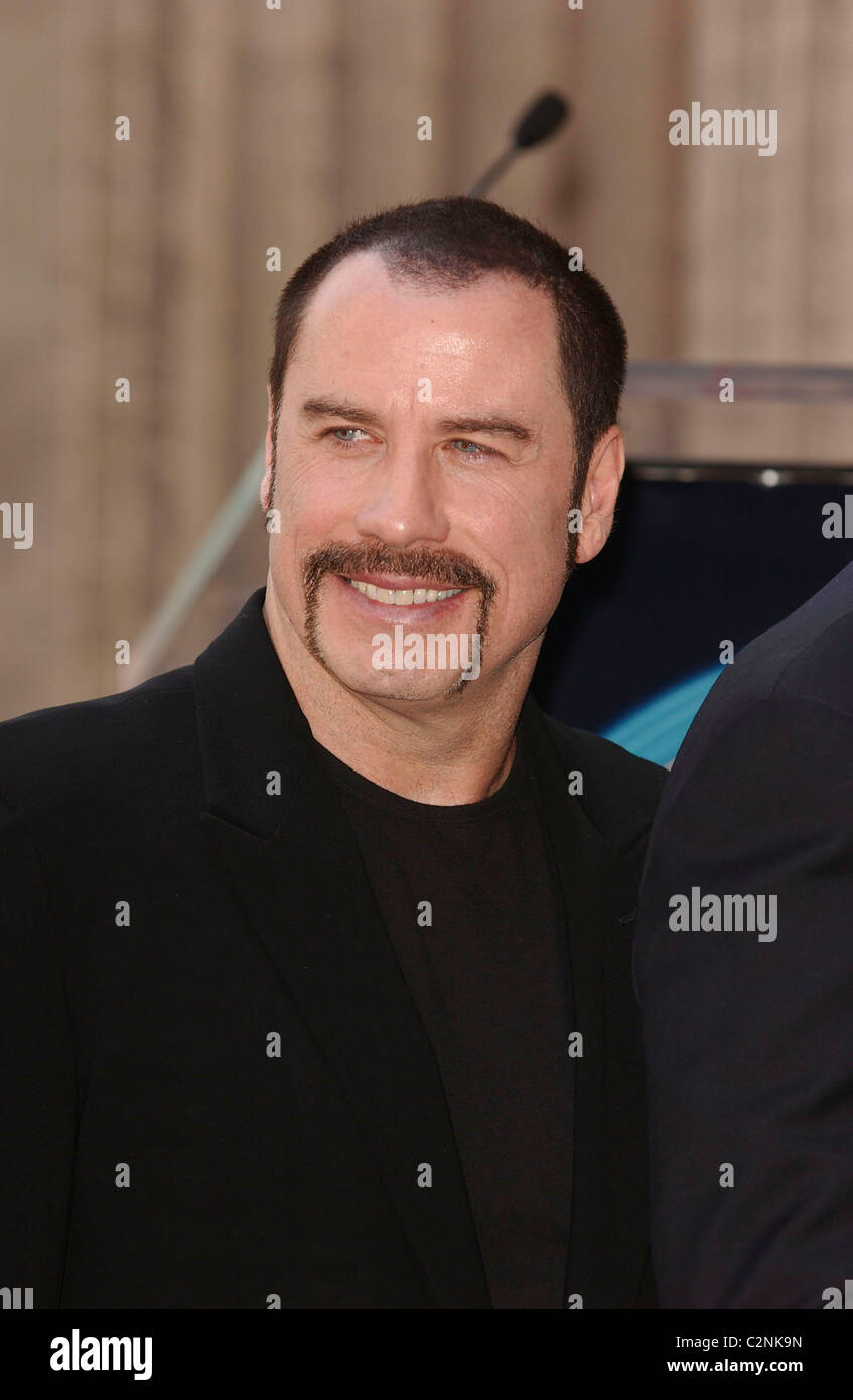 Michael eisner and john travolta hi-res stock photography and images ...