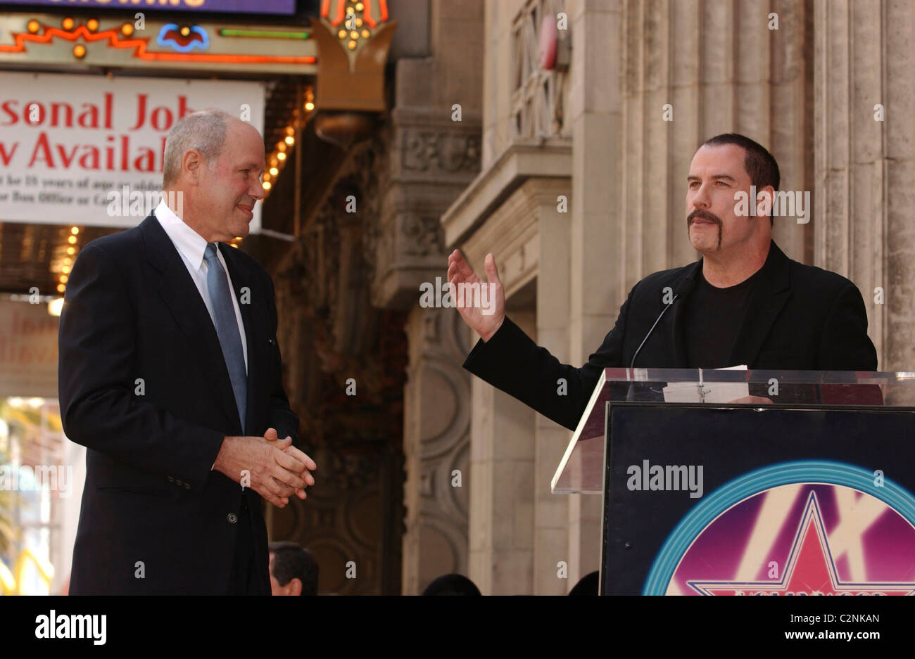 Michael eisner and john travolta hi-res stock photography and images ...