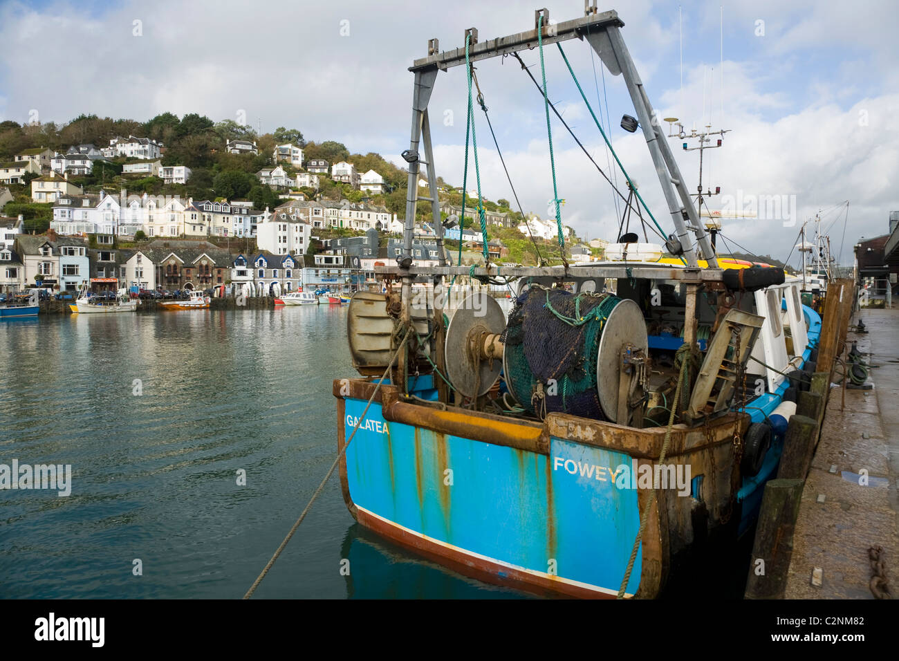 Cornish fishing boat with fishing net / nets and gear, moored at the ...