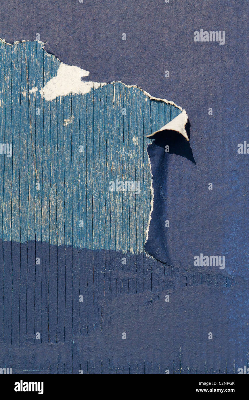 Peeling blue paper background Stock Photo - Alamy