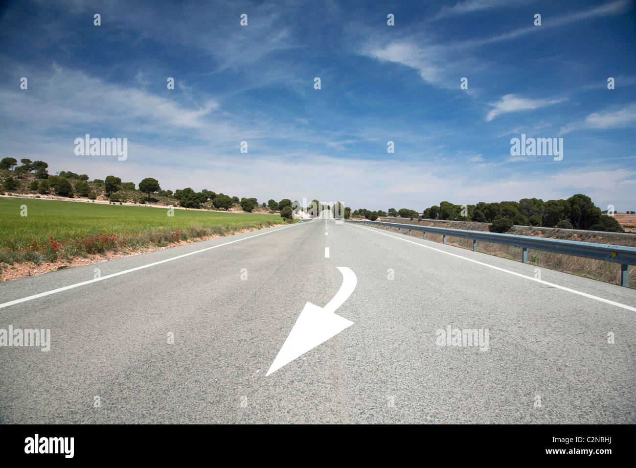Road highway arrow hi-res stock photography and images - Alamy