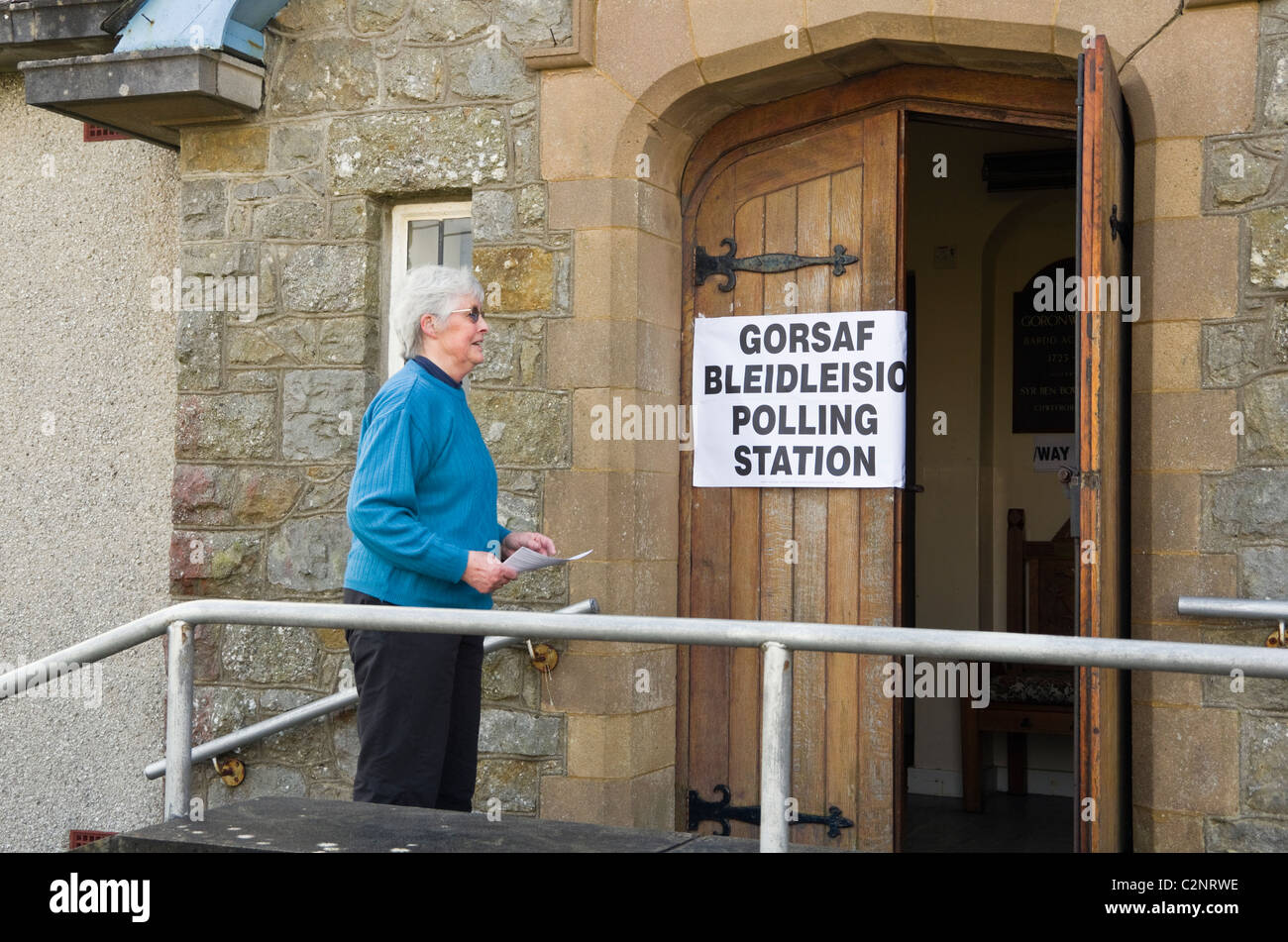 Person people entering polling station hi-res stock photography and ...