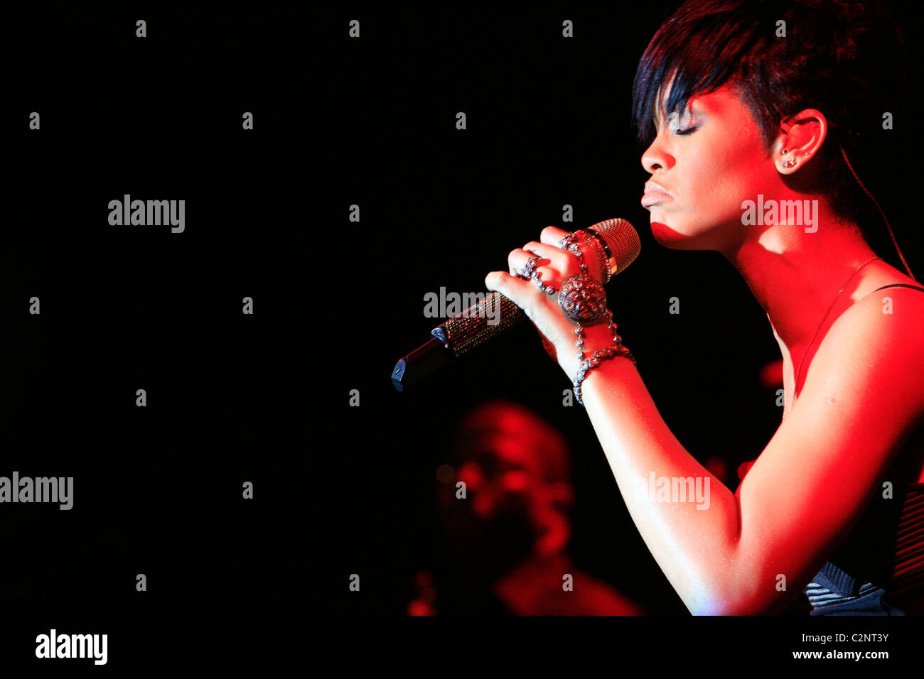 Rihanna performs at the Island Def Jam & Escada Moon Sparkle's 'A Girls ...