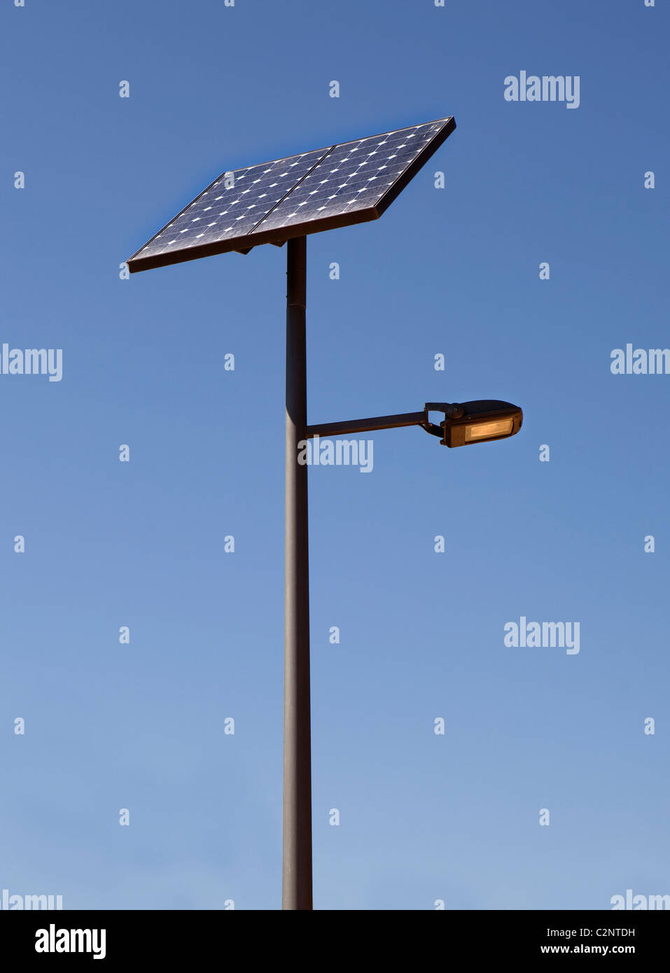 Green energy - A street light powered by a solar panel Stock Photo - Alamy