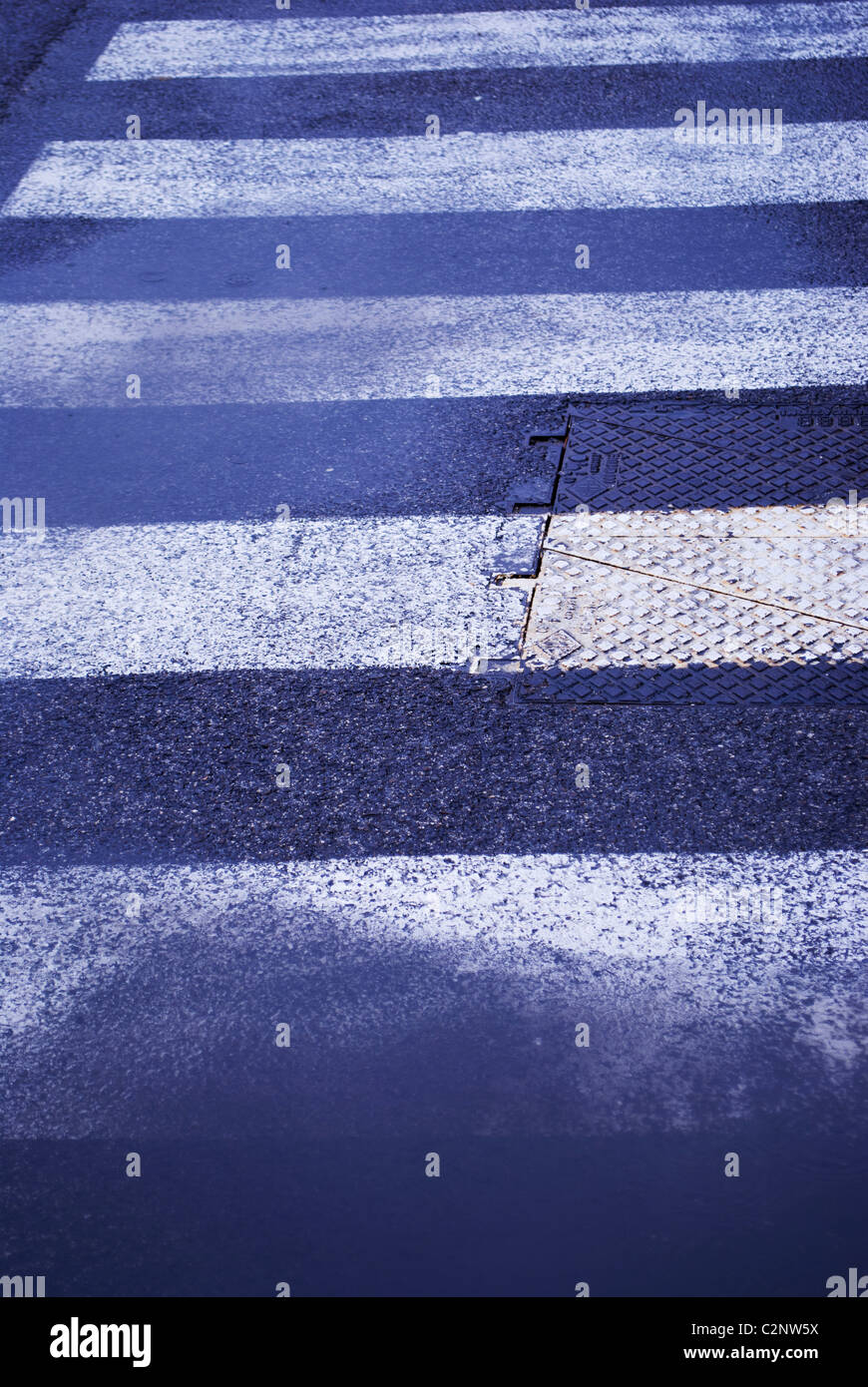 black and white zebra crossing, on wet roads Stock Photo - Alamy