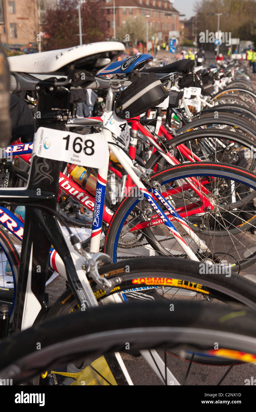 Transition zone for competing tri athletes in triathlon with kit laid ...