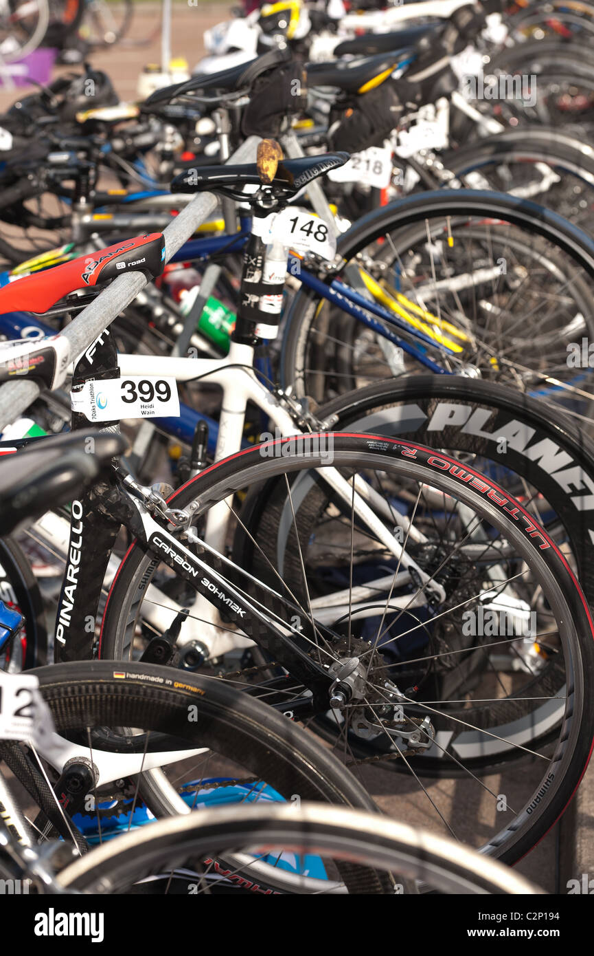 Transition zone for competing tri athletes in triathlon with kit laid ...