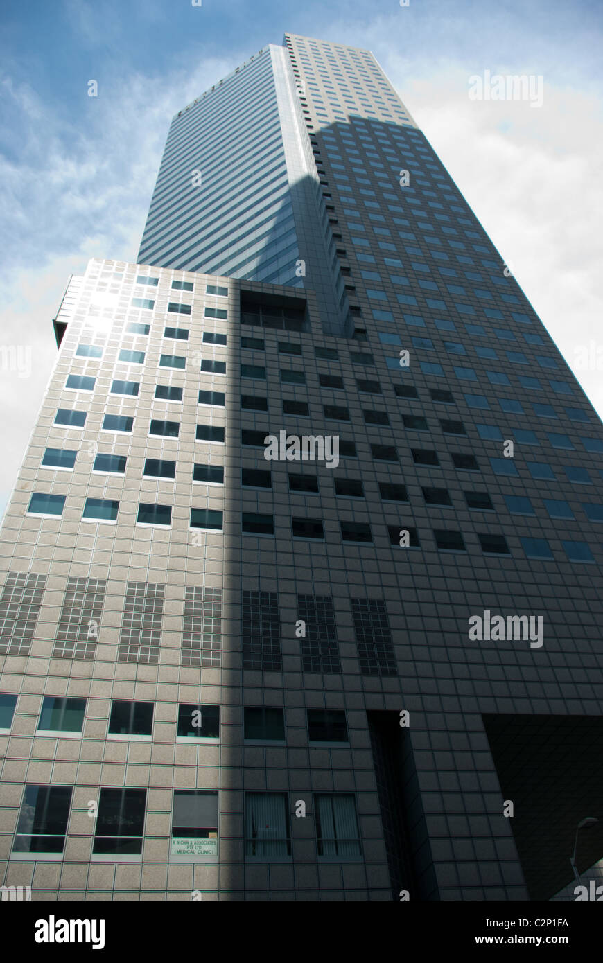 Tall modern office building in color Stock Photo - Alamy