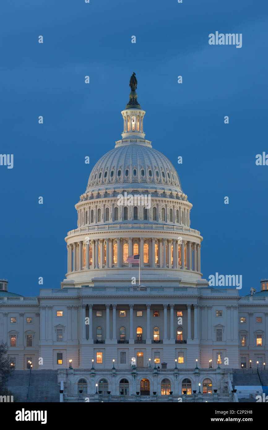 Lights illuminate the US Capitol Building after sunset in Washington ...