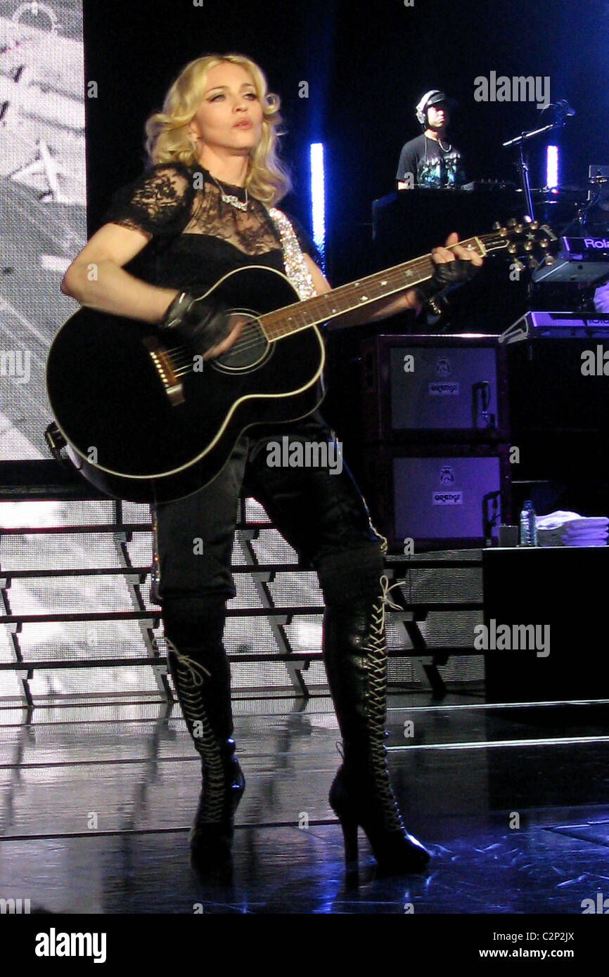 Madonna performing at a thank you show for fans to celebrate the ...