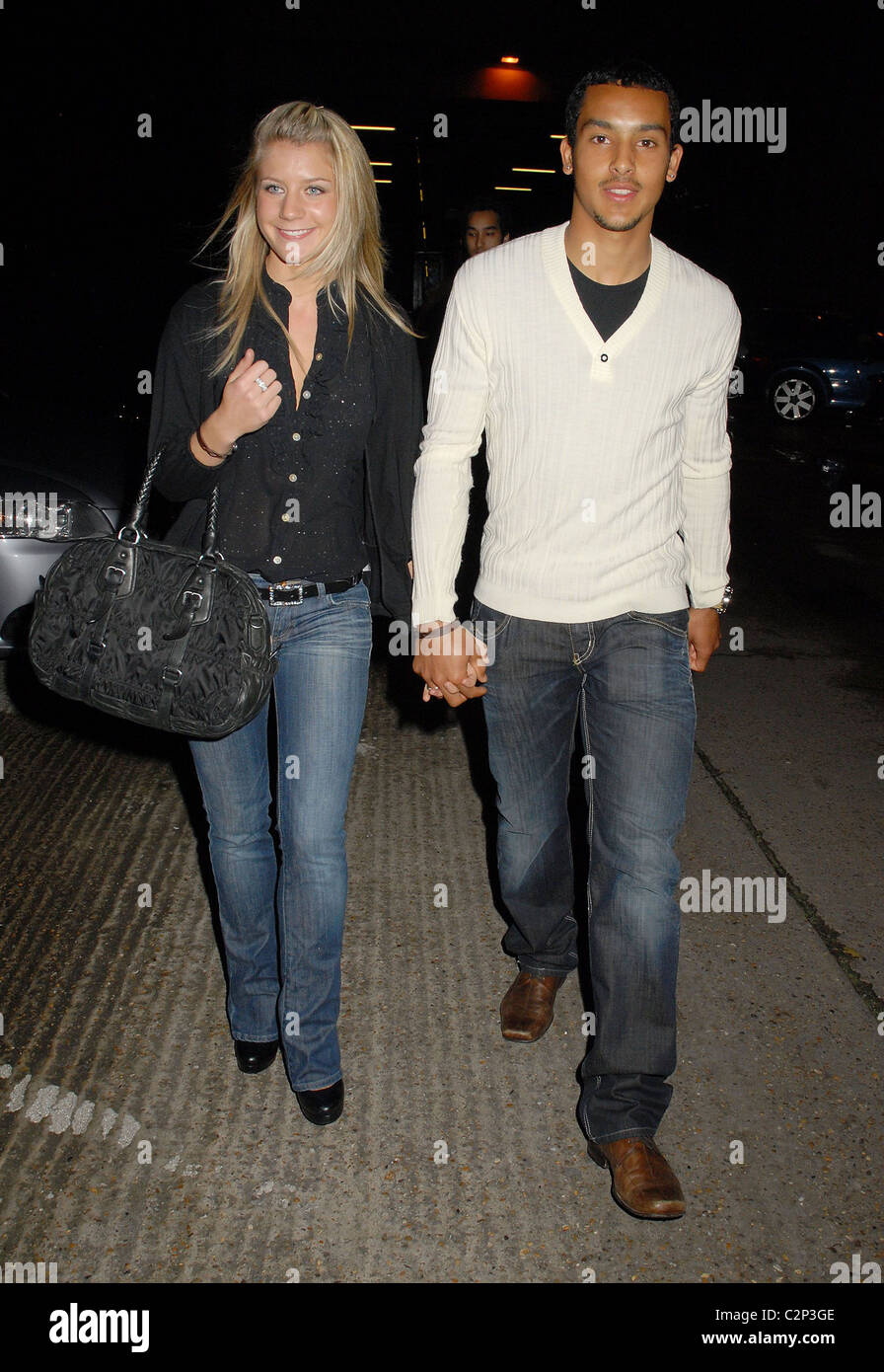 Melanie Slade and Theo Walcott arrive at the private viewing of 'Get ...