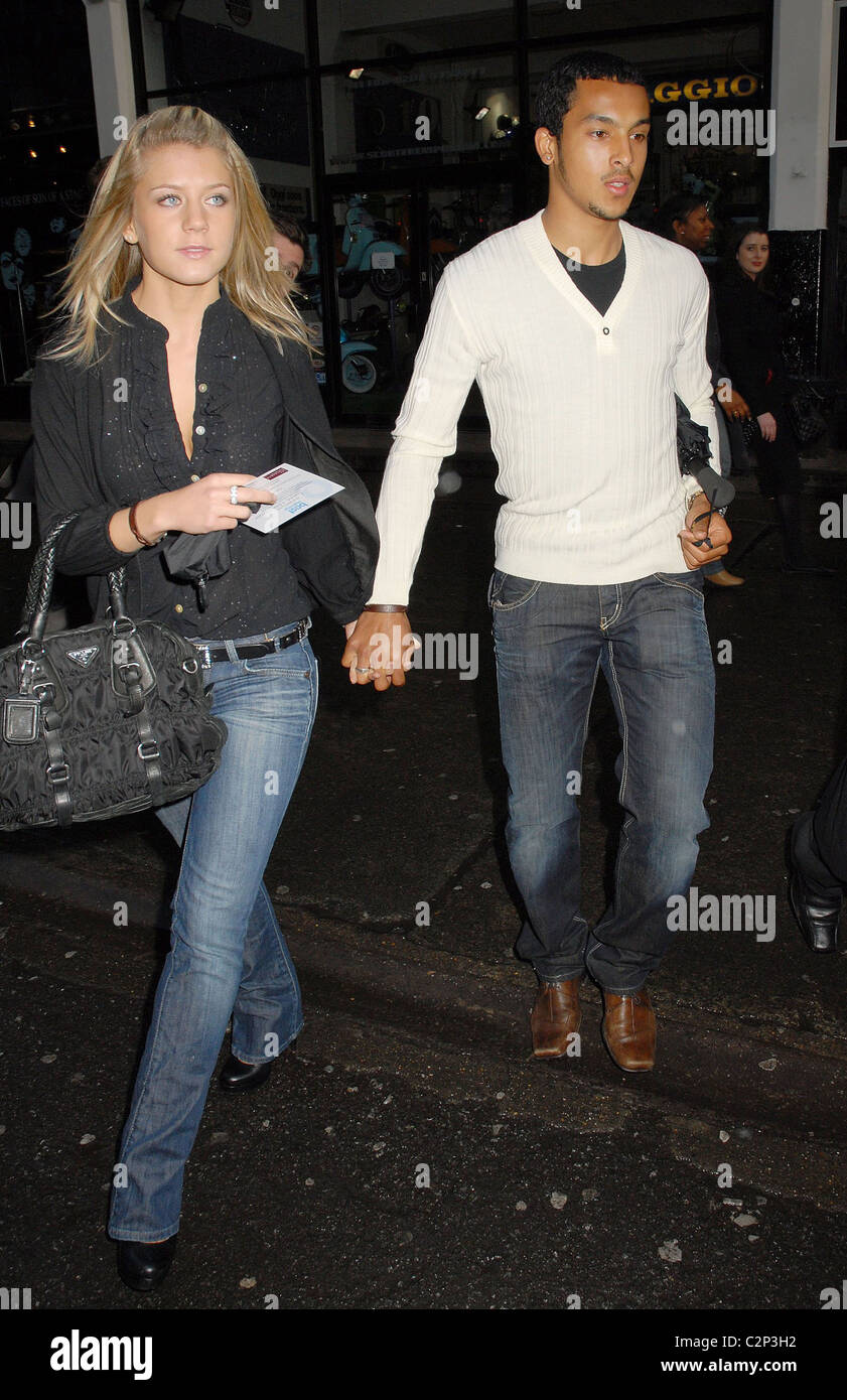 Melanie Slade and Theo Walcott arrive at the private viewing of 'Get ...