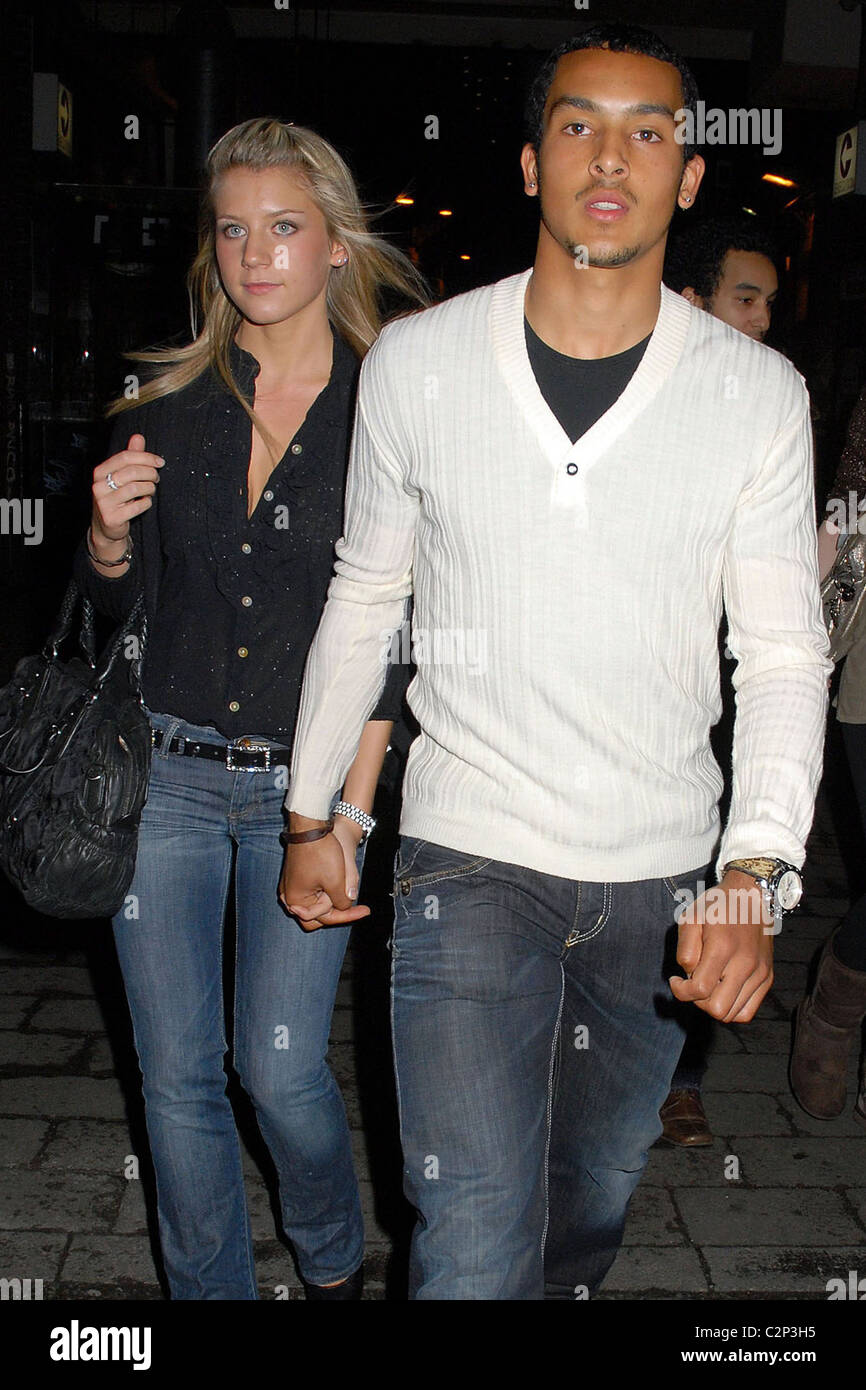 Melanie Slade and Theo Walcott arrive at the private viewing of 'Get ...