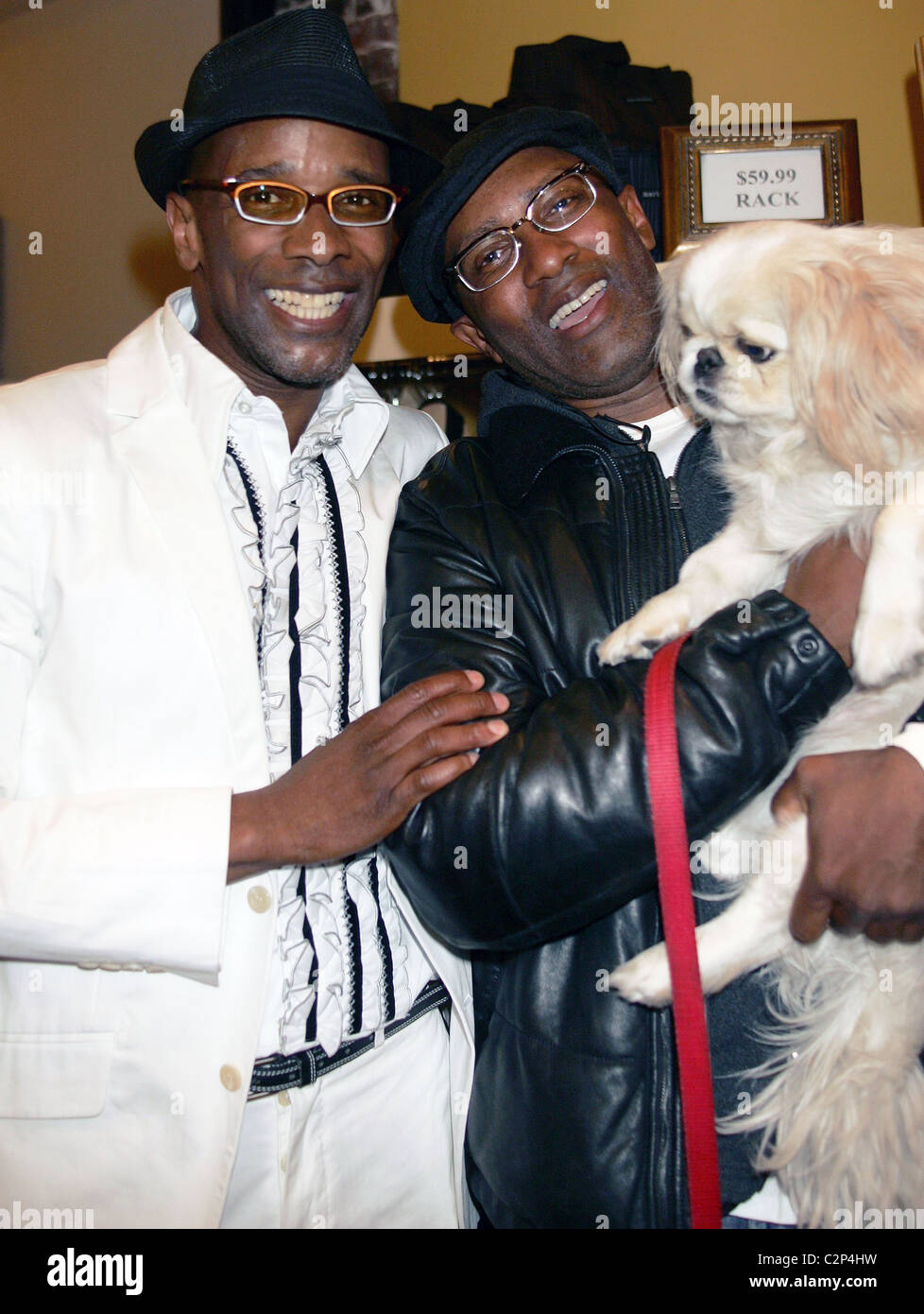 Jonathan Bodrick and Guest owner of 'B.O.R.N Vintage Boutique' at his Harlem store New York City ...