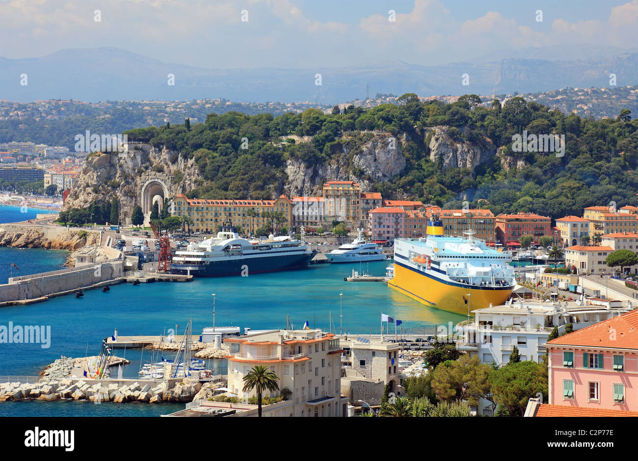 Harbor with luxury yachts, cruise ships of the city of Nice, France ...