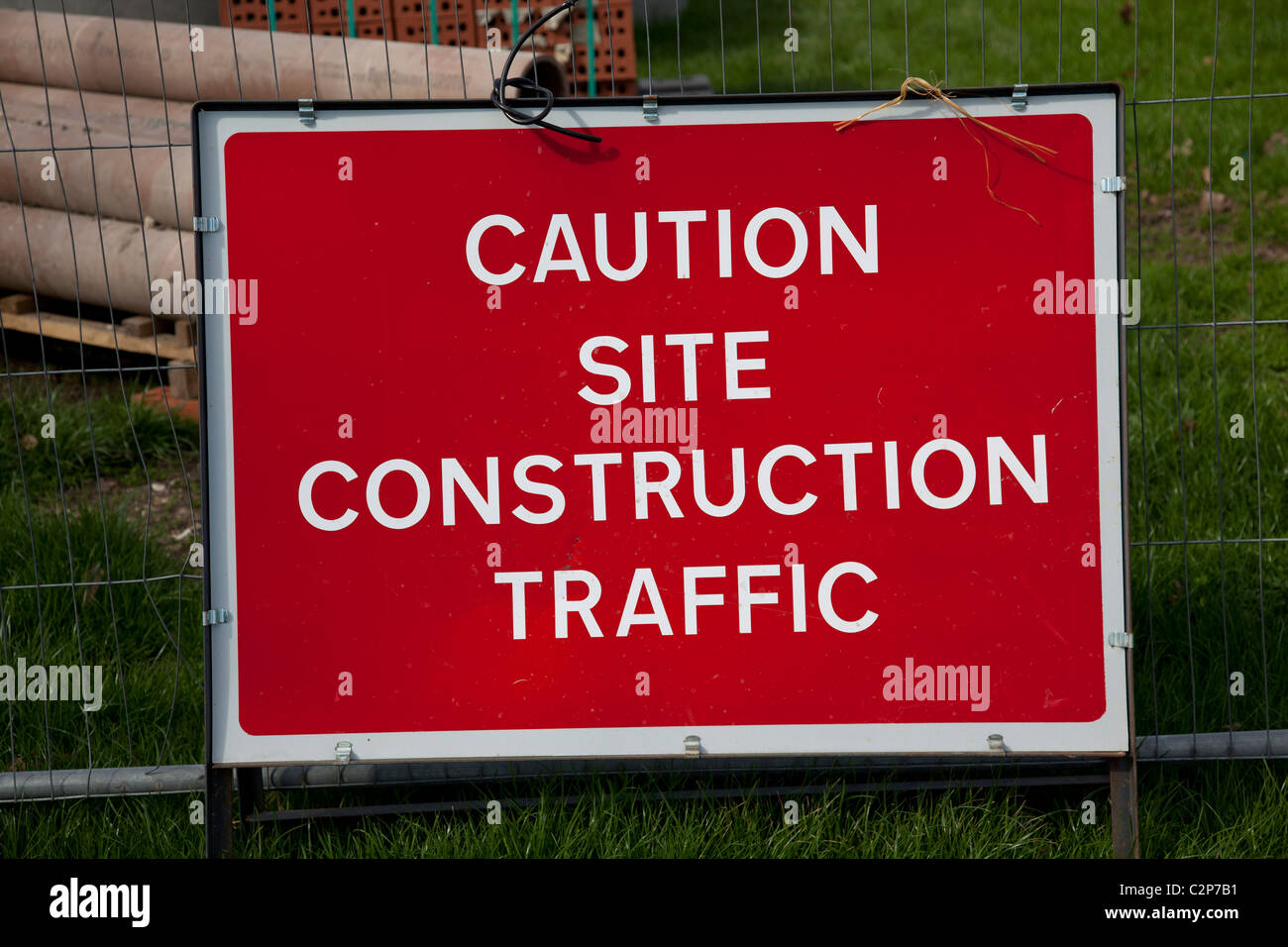 Red construction site sign Stock Photo - Alamy
