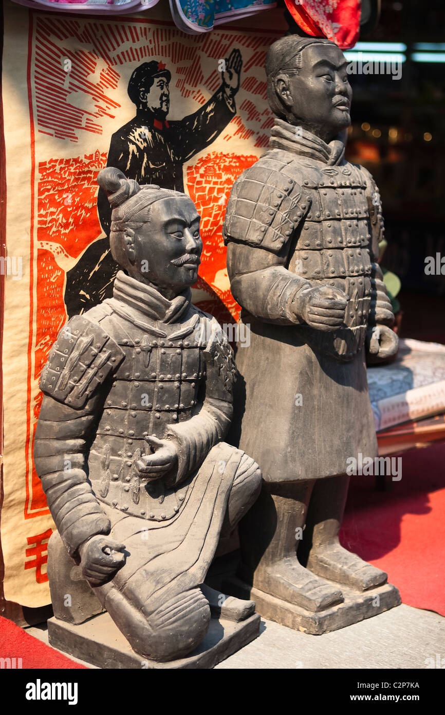beijing: terra cotta warriors and poster of chairman mao Stock Photo ...
