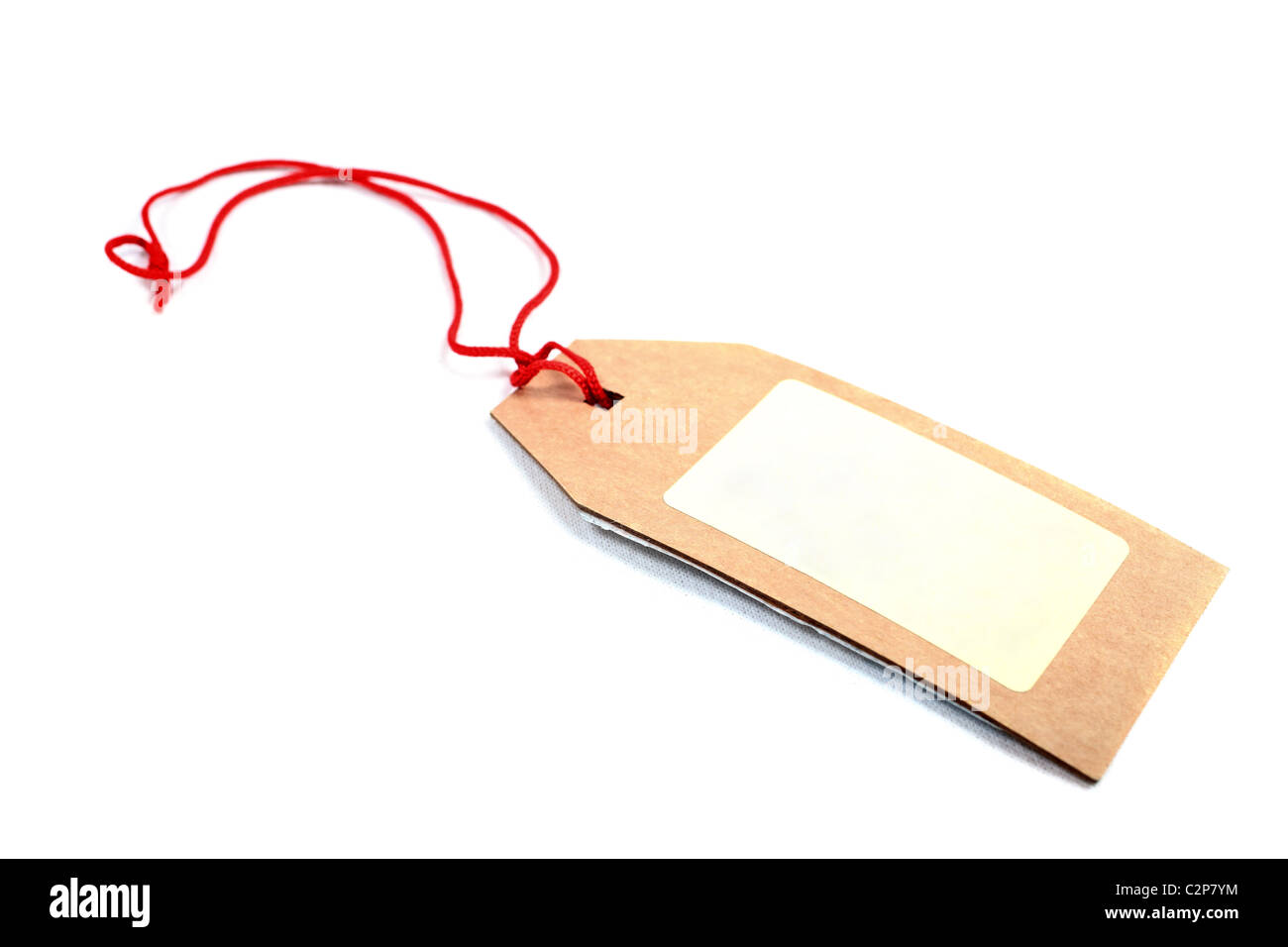 Price tag made of brown cardboard with red rope isolated on white ...
