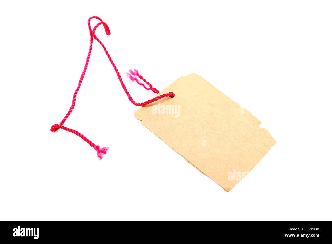 Price tag made of brown cardboard with red rope isolated on white ...
