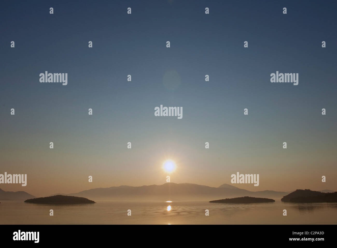 sunrise over sea and islands Stock Photo - Alamy