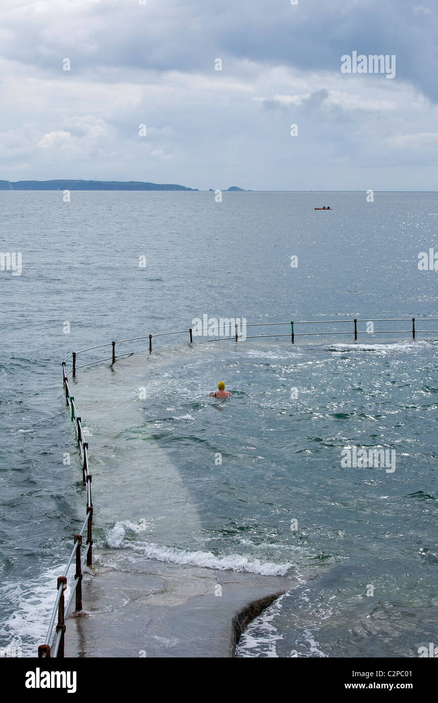 Swimmer in La Vallette bathing pool, Havelet Bay, St Peter Port ...
