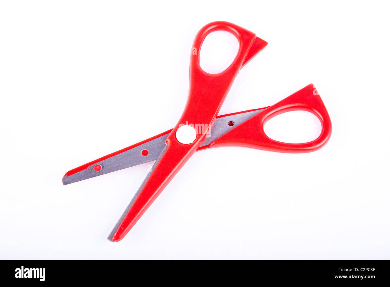 red scissors on white background Stock Photo - Alamy