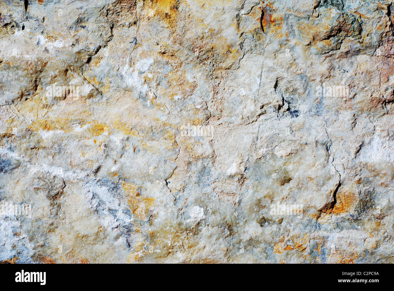 Natural yellow and blue colors of a stone Stock Photo - Alamy